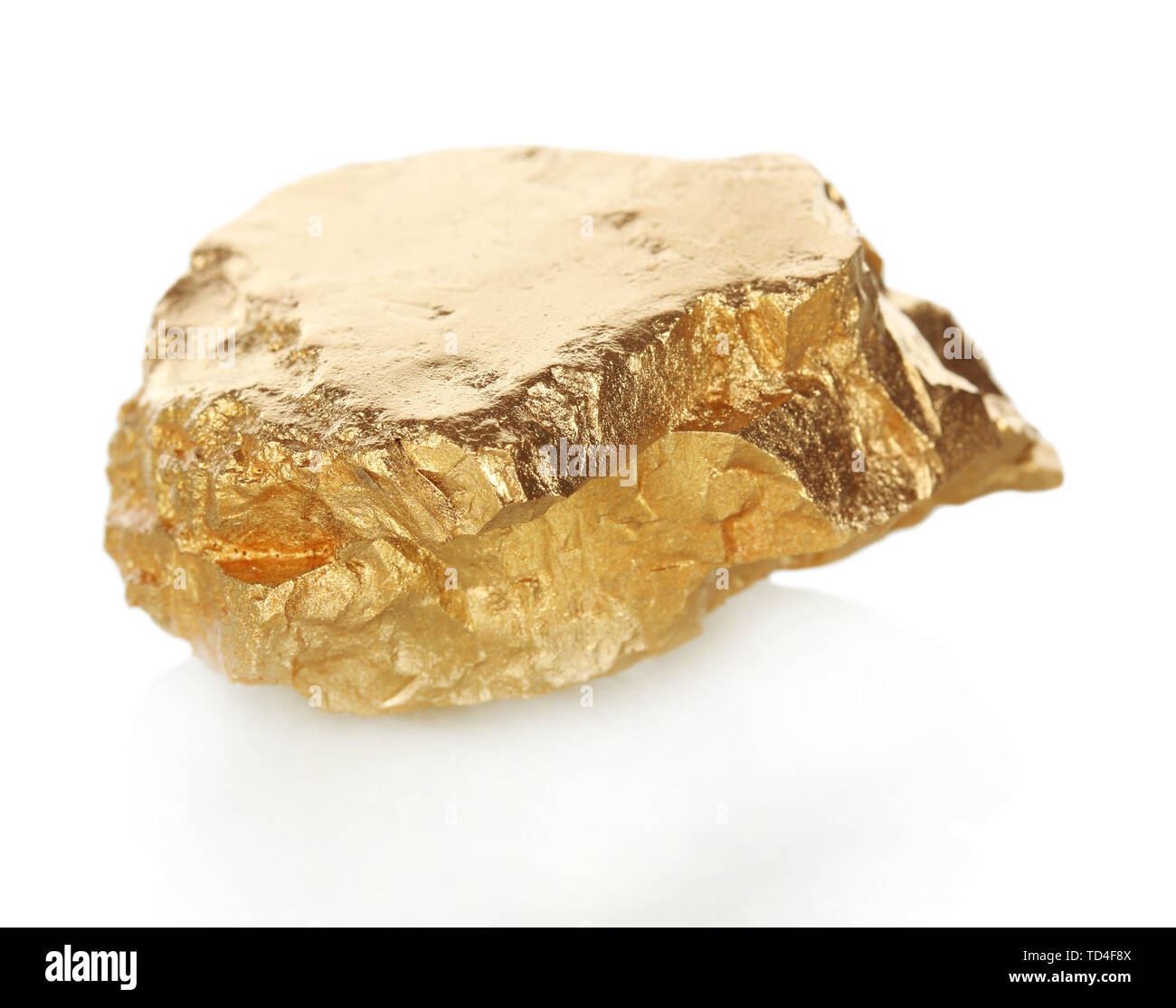 Golden nugget isolated on white Stock Photo - Alamy