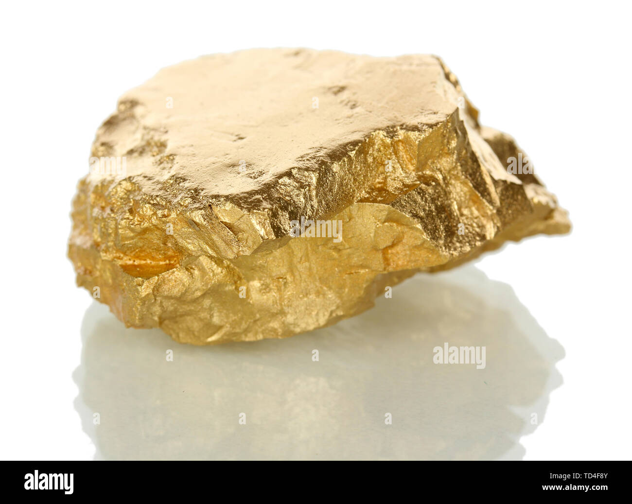 Golden nugget isolated on white Stock Photo - Alamy