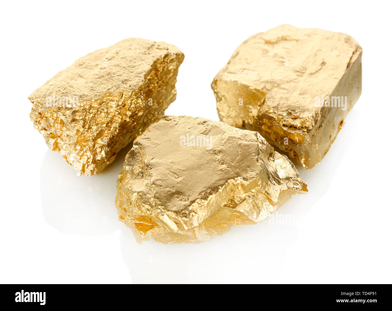 Golden nuggets isolated on white Stock Photo - Alamy