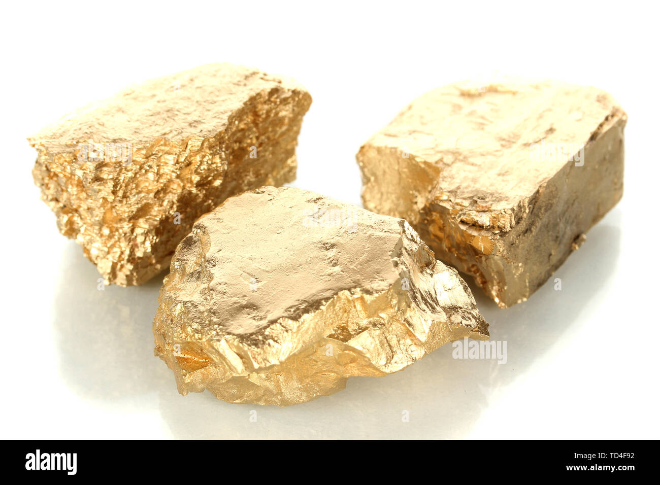Golden nuggets isolated on white Stock Photo - Alamy