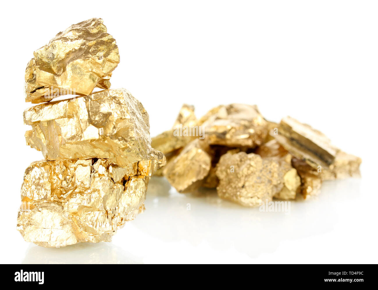 Golden nuggets isolated on white Stock Photo - Alamy