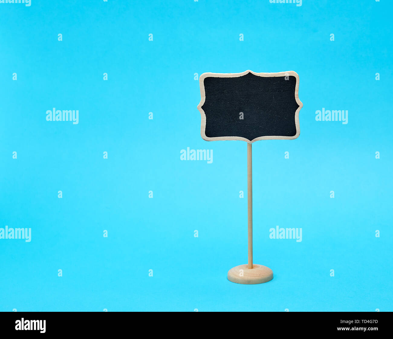 wooden pointer on a stick for writing text, blue background Stock Photo ...