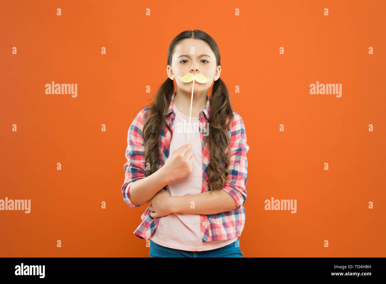 Feeling manly. Fun and humor. Girl child having fun. Entertainment ...