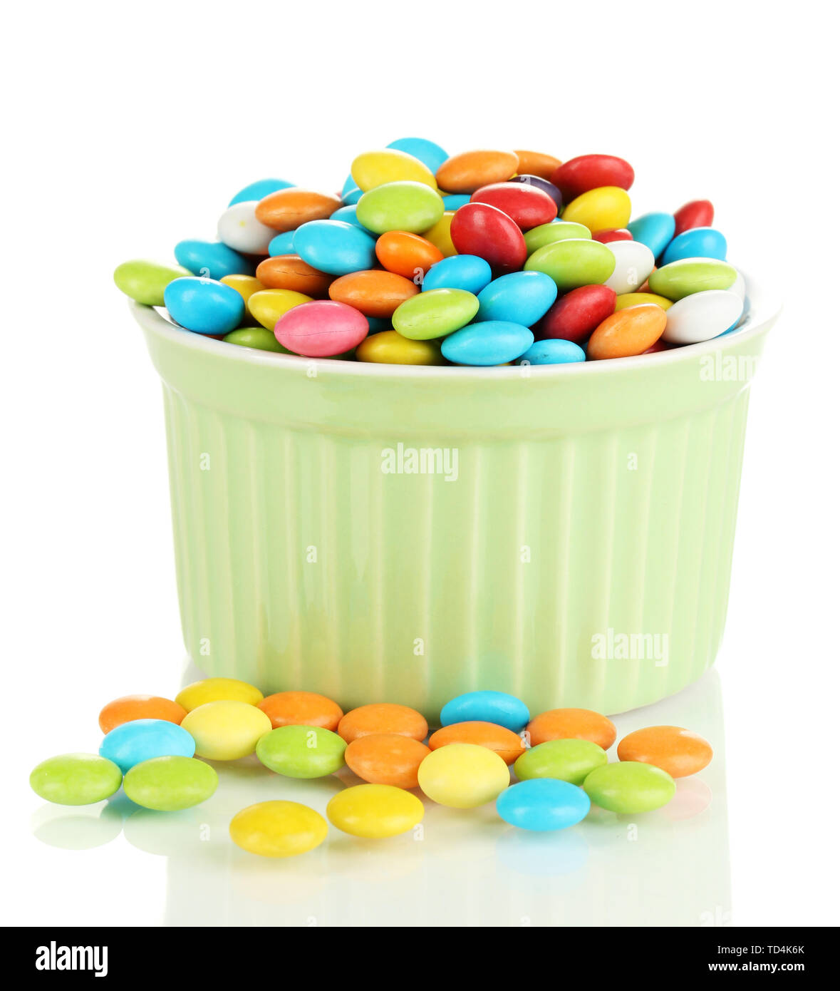Colorful candies in bowl isolated on white Stock Photo - Alamy