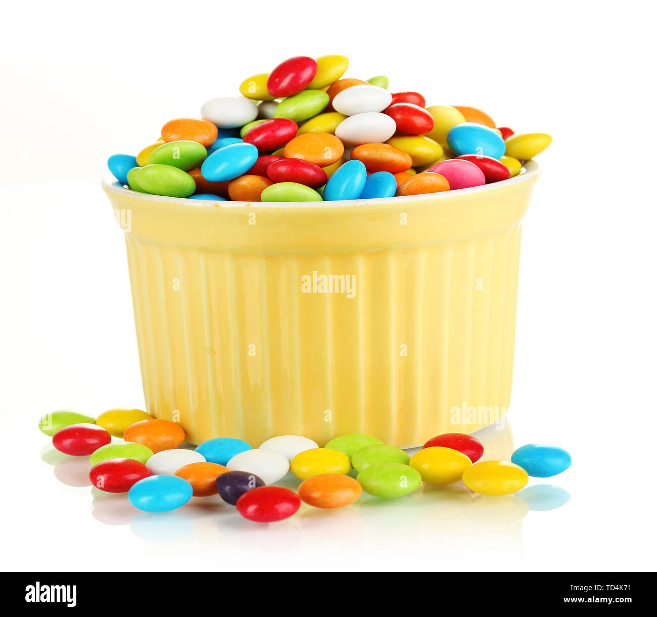 Colorful candies in bowl isolated on white Stock Photo - Alamy