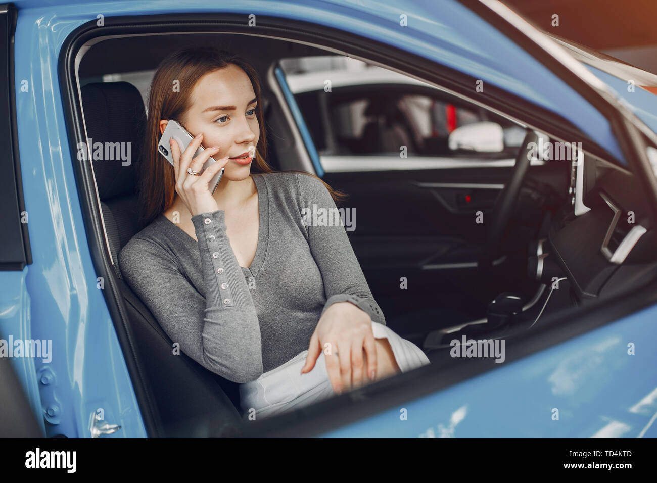 Young lady car salon hi-res stock photography and images - Alamy
