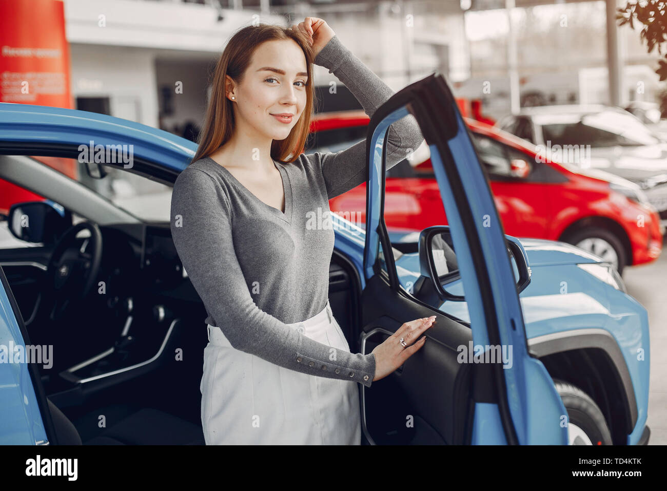 Young lady car salon hi-res stock photography and images - Alamy