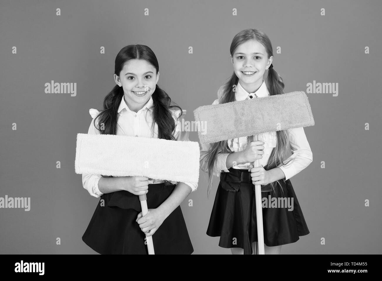 We are on duty today. Pupil cleaning classroom. Nice and tidy ...