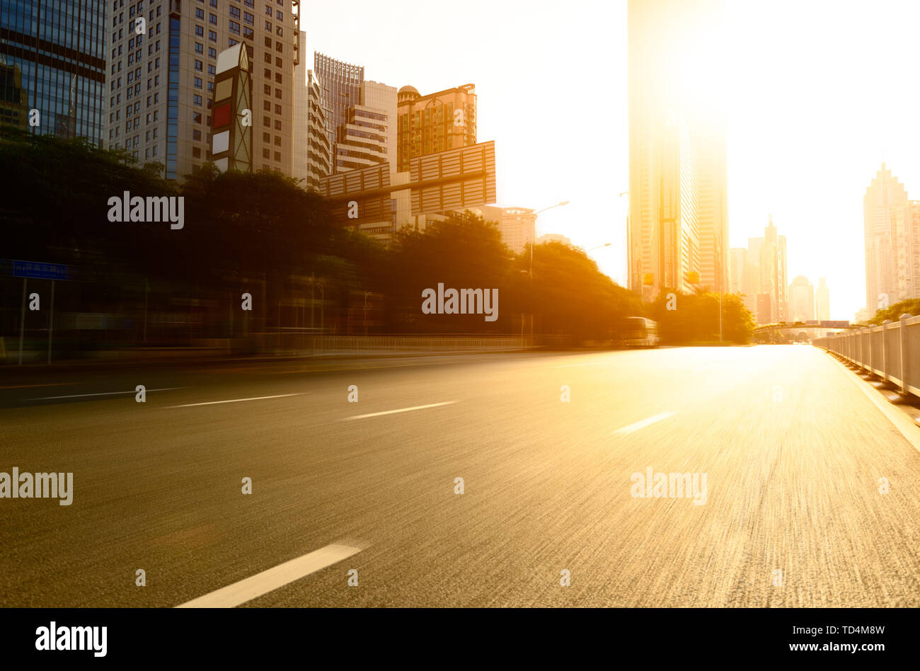 Modern city street and skyscrapers Stock Photo - Alamy