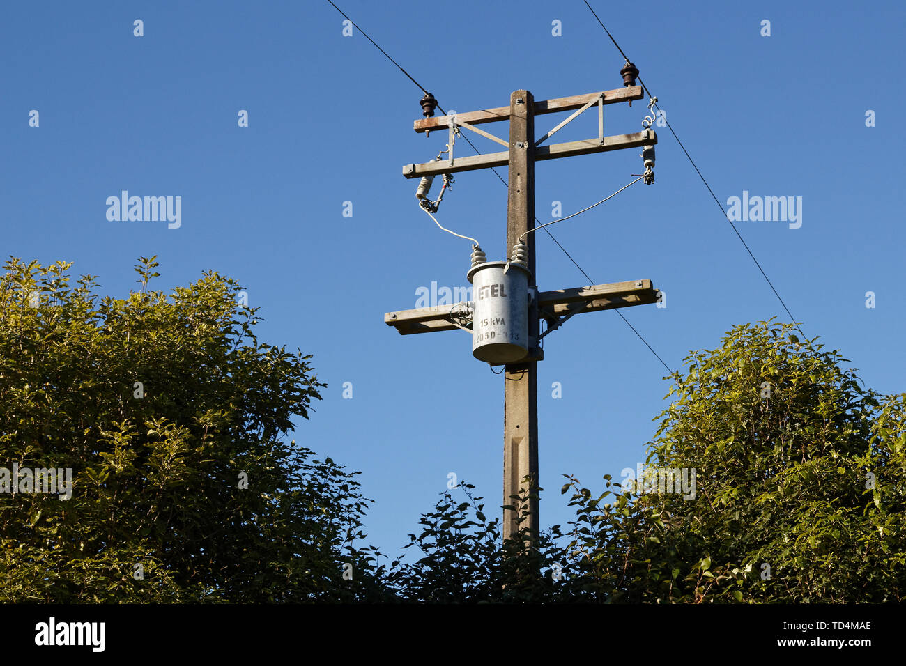 Electric transmission lines wooden poles hi-res stock photography and ...