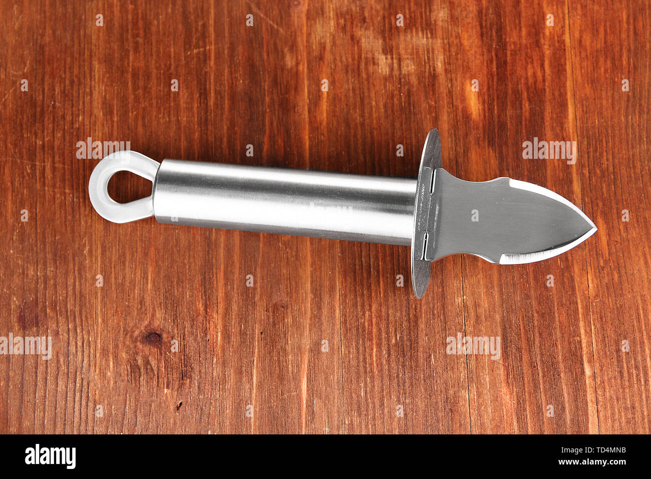 Oyster knife, on wooden background Stock Photo - Alamy
