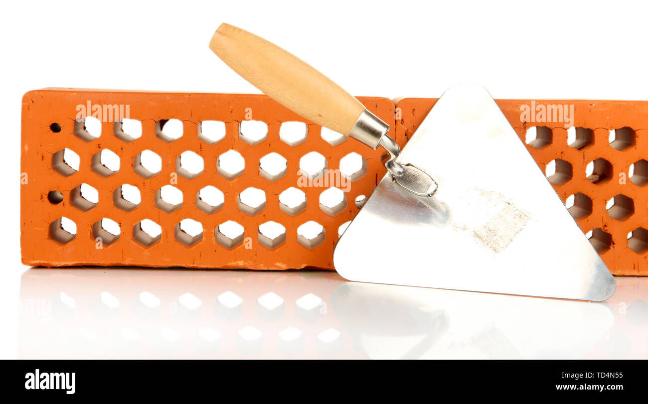 Metal tool for building and bricks isolated on white Stock Photo - Alamy