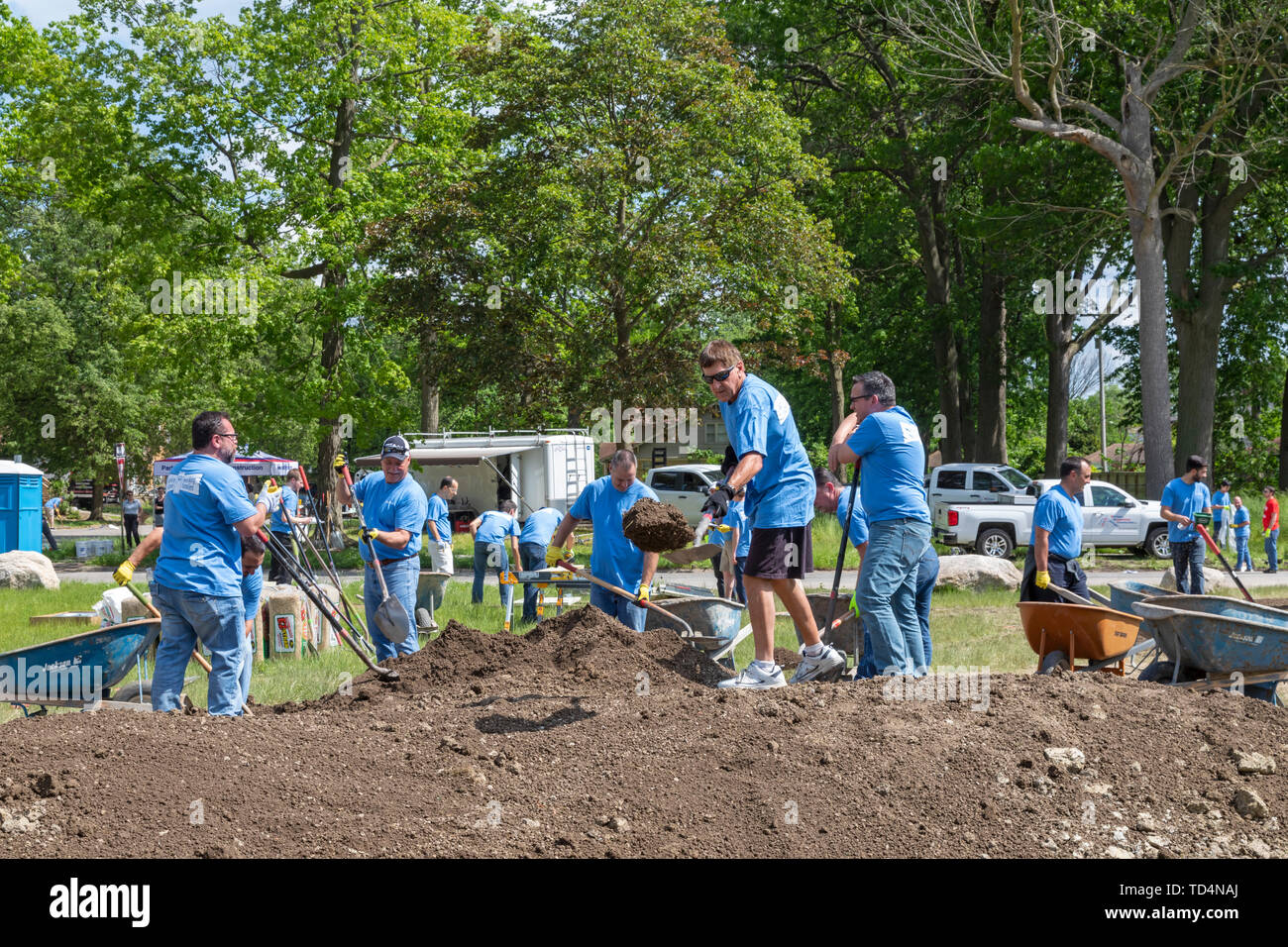 Detroit, Michigan - Volunteers from Cooper Standard help build a new ...