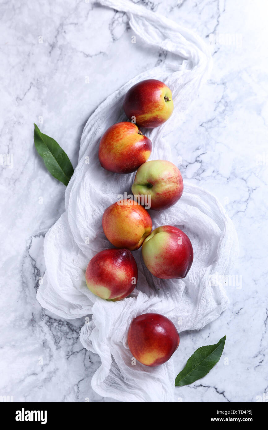 Peach fruit flat background Stock Photo - Alamy