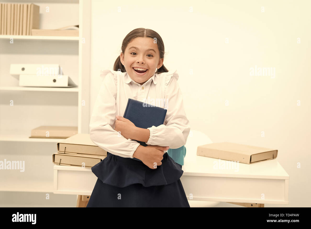 Information concept. Happy child got information from reading. Child ...