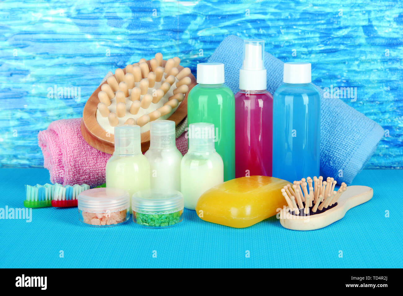 Hotel cosmetics kit on bright color background Stock Photo - Alamy