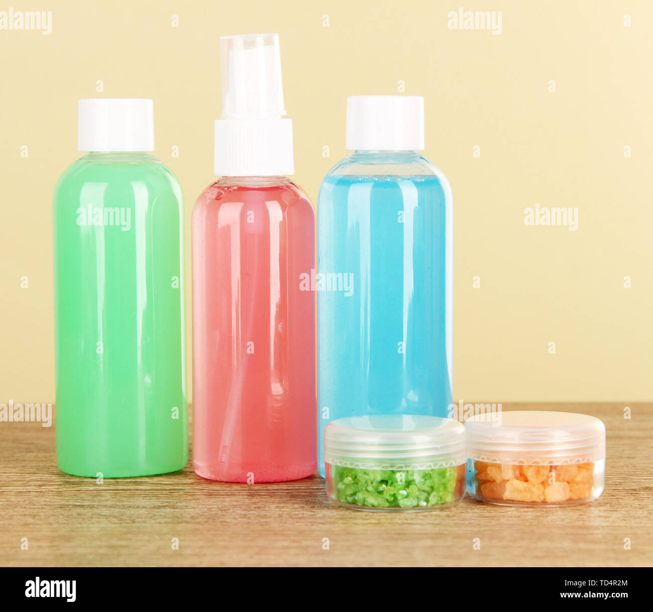 Hotel amenities kit on table on beige background Stock Photo - Alamy