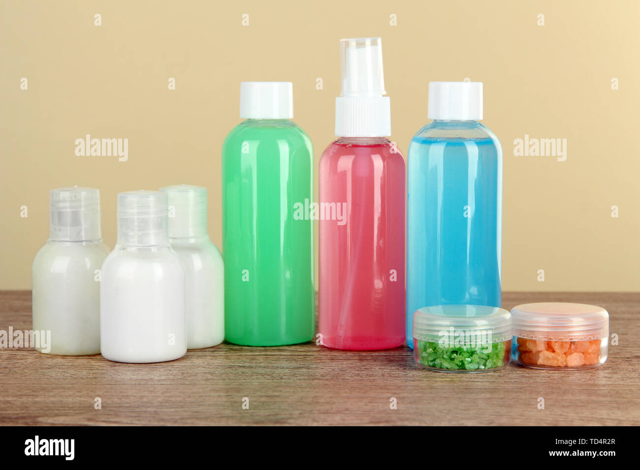 Hotel amenities kit on table on beige background Stock Photo - Alamy
