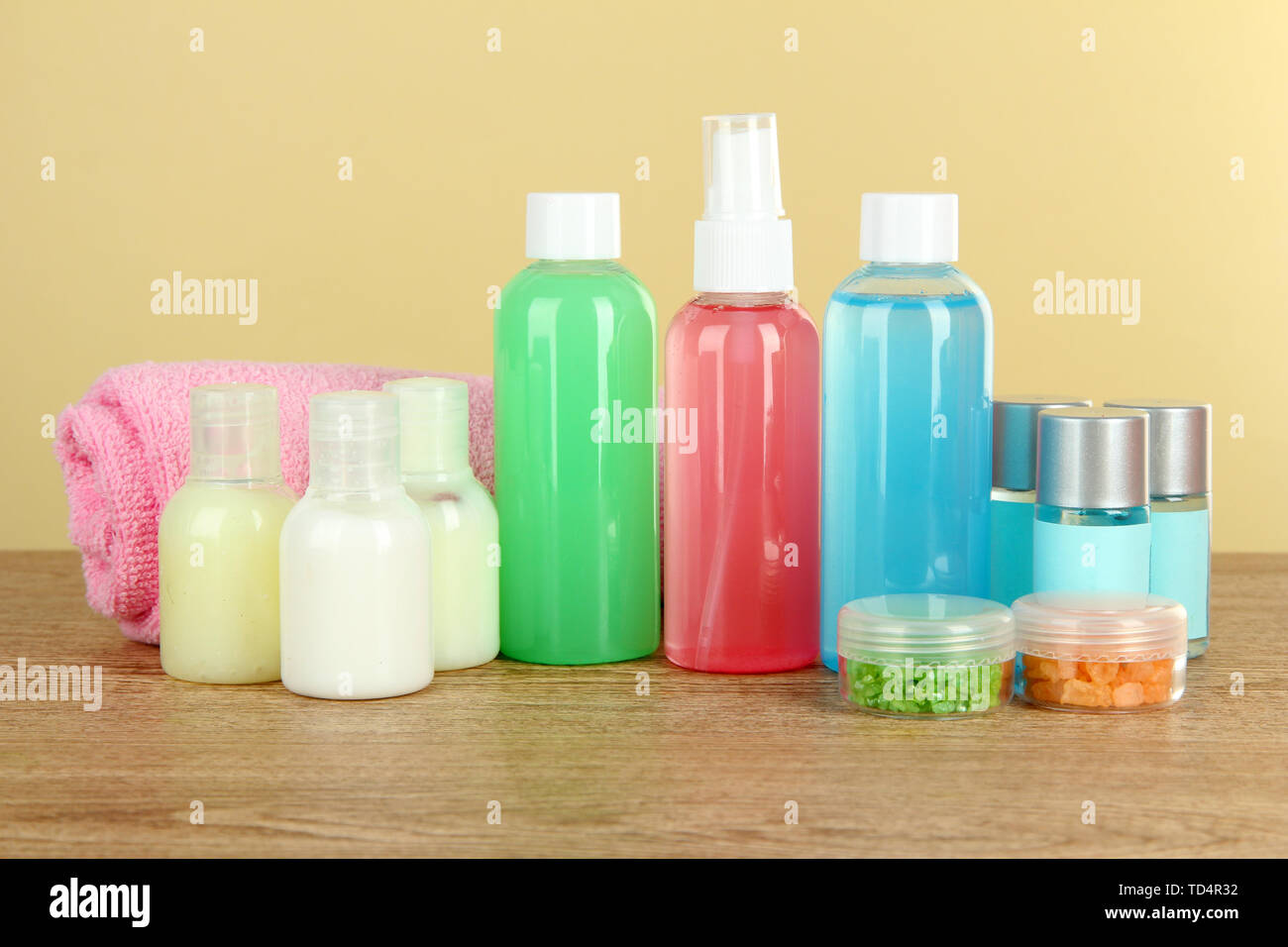 Hotel amenities kit on table on beige background Stock Photo - Alamy