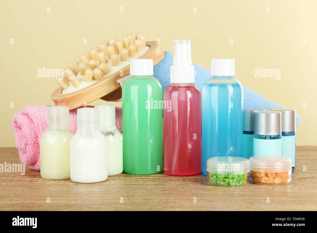 Hotel amenities kit on table on beige background Stock Photo - Alamy
