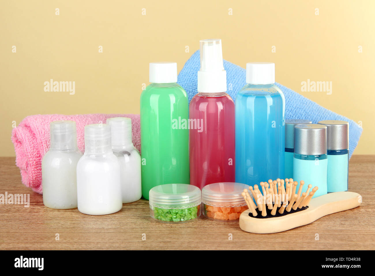 Hotel amenities kit on table on beige background Stock Photo - Alamy