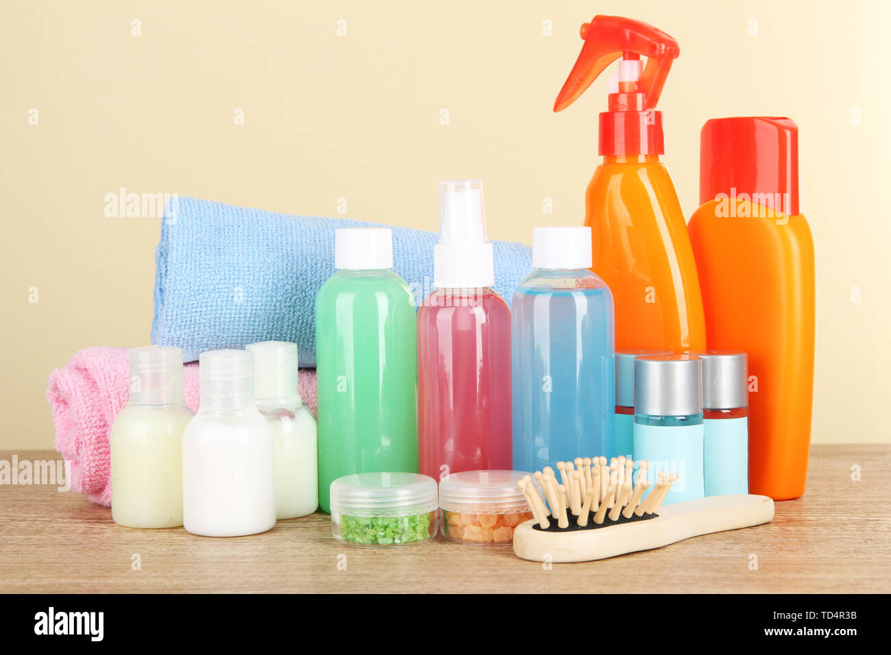 Hotel amenities kit on table on beige background Stock Photo - Alamy