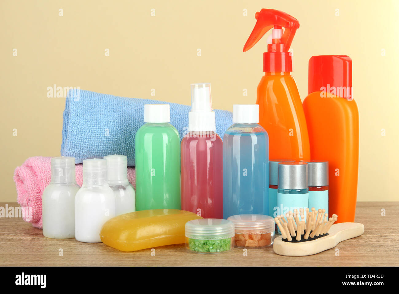 Hotel amenities kit on table on beige background Stock Photo - Alamy