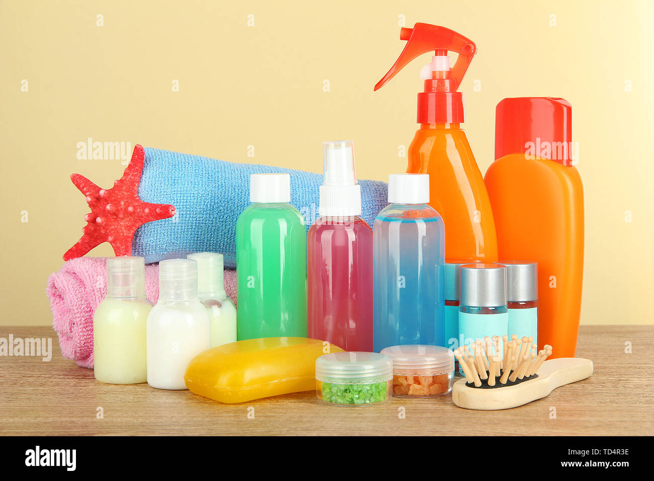 Hotel amenities kit on table on beige background Stock Photo - Alamy