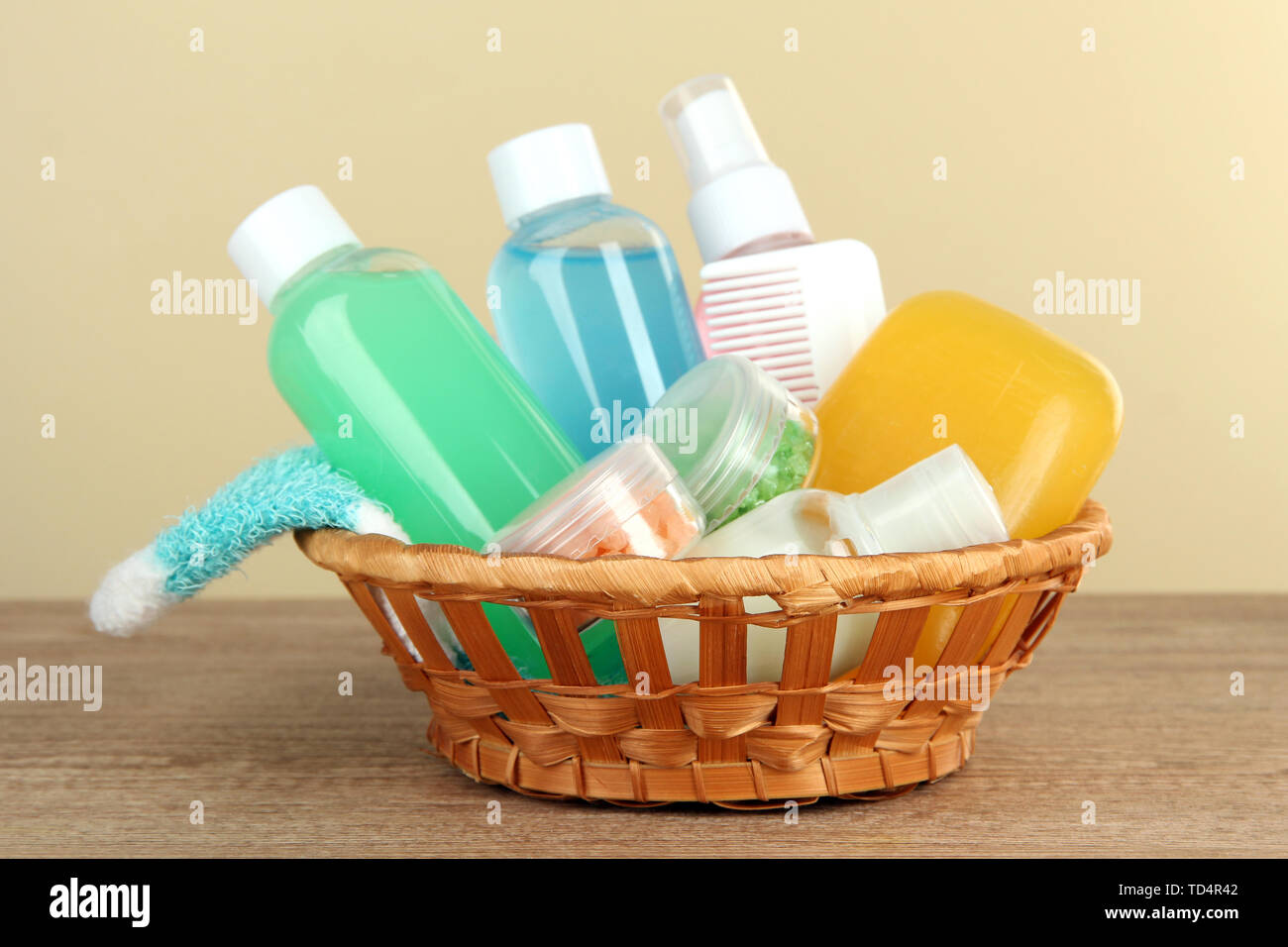 Hotel amenities kit on table on beige background Stock Photo - Alamy