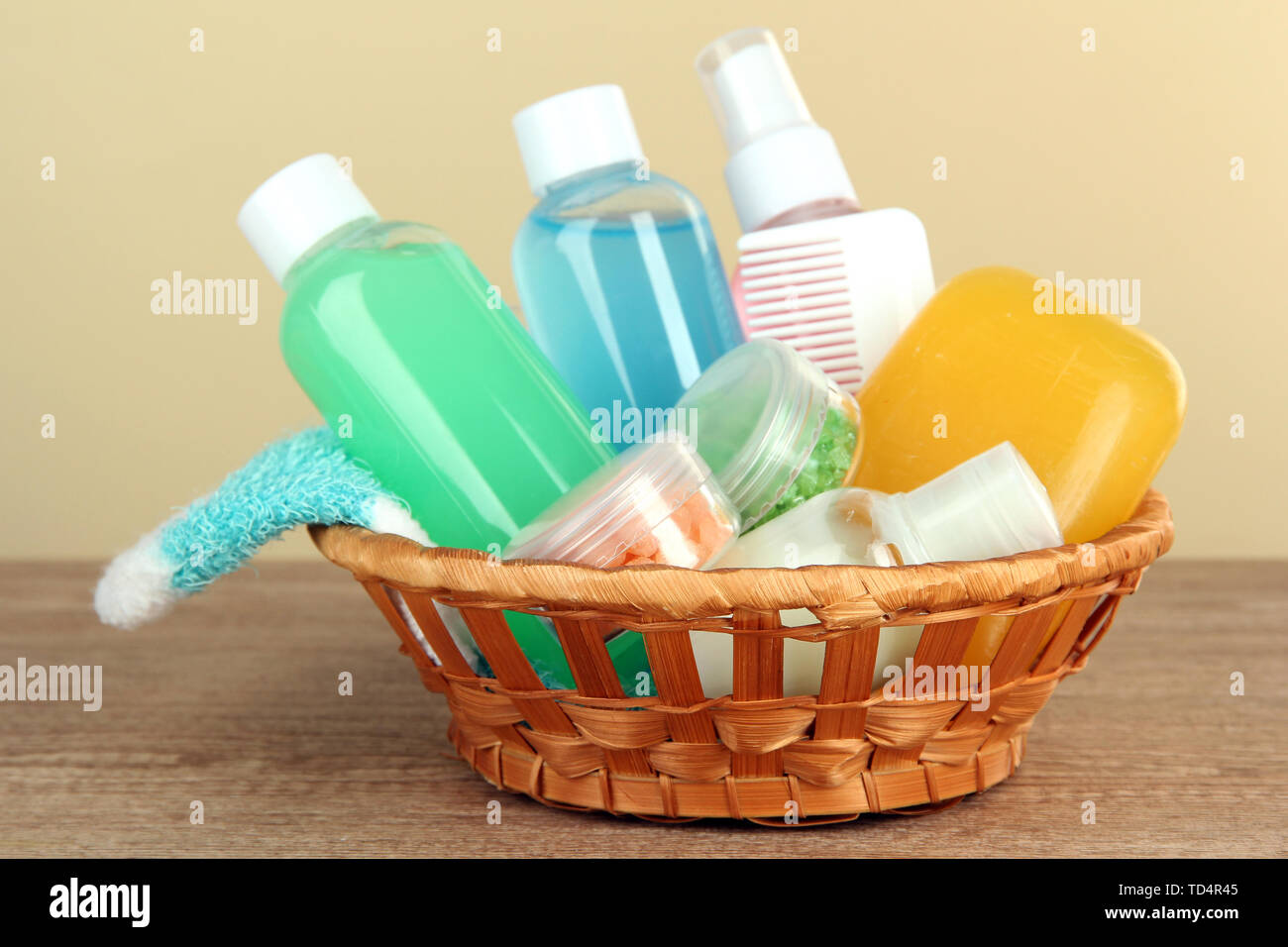 Hotel amenities kit on table on beige background Stock Photo - Alamy