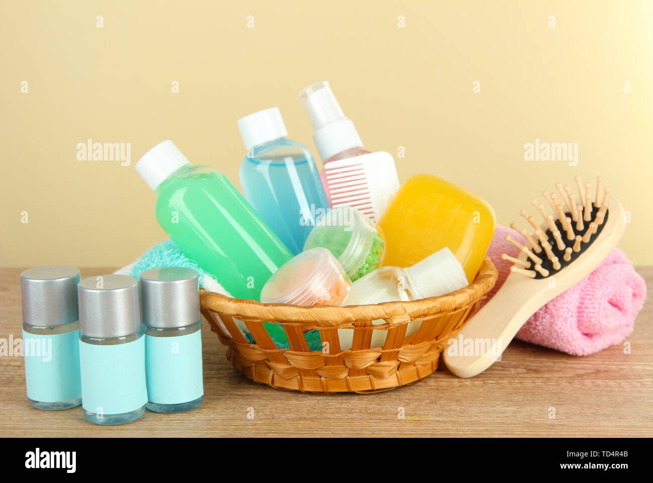 Hotel amenities kit on table on beige background Stock Photo - Alamy