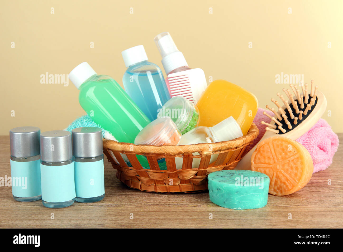 Hotel amenities kit on table on beige background Stock Photo - Alamy