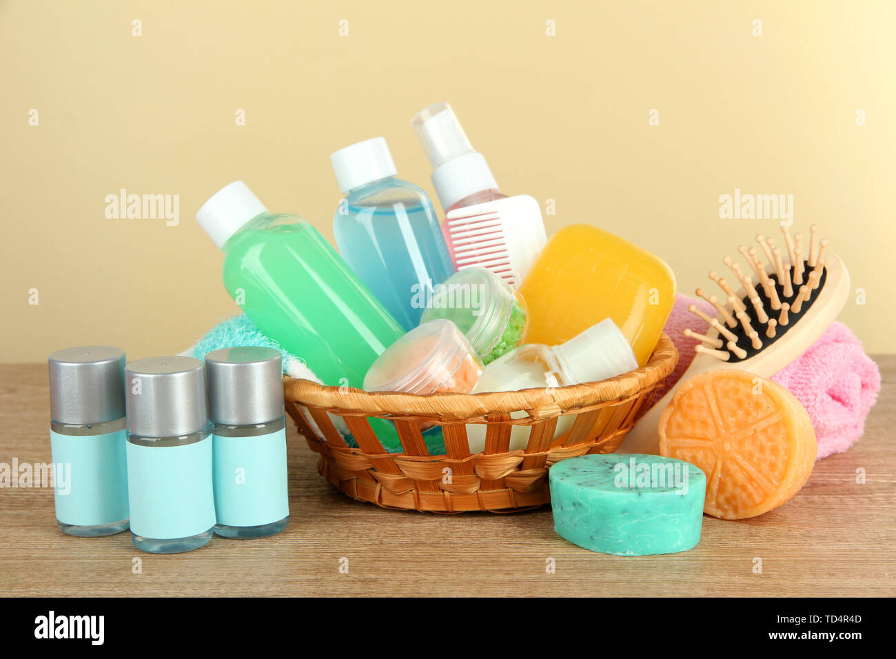 Hotel amenities kit on table on beige background Stock Photo - Alamy