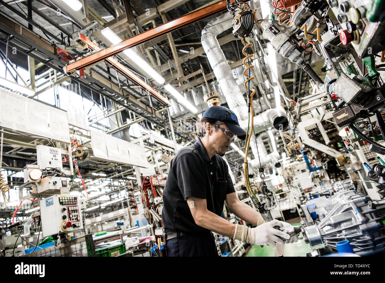 JULY 6, 2018 - File Photo - A Toyota employee assembles engine parts at ...