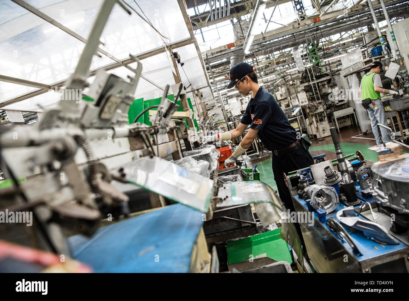 JULY 6, 2018 - File Photo - A Toyota employee assembles engine parts at ...