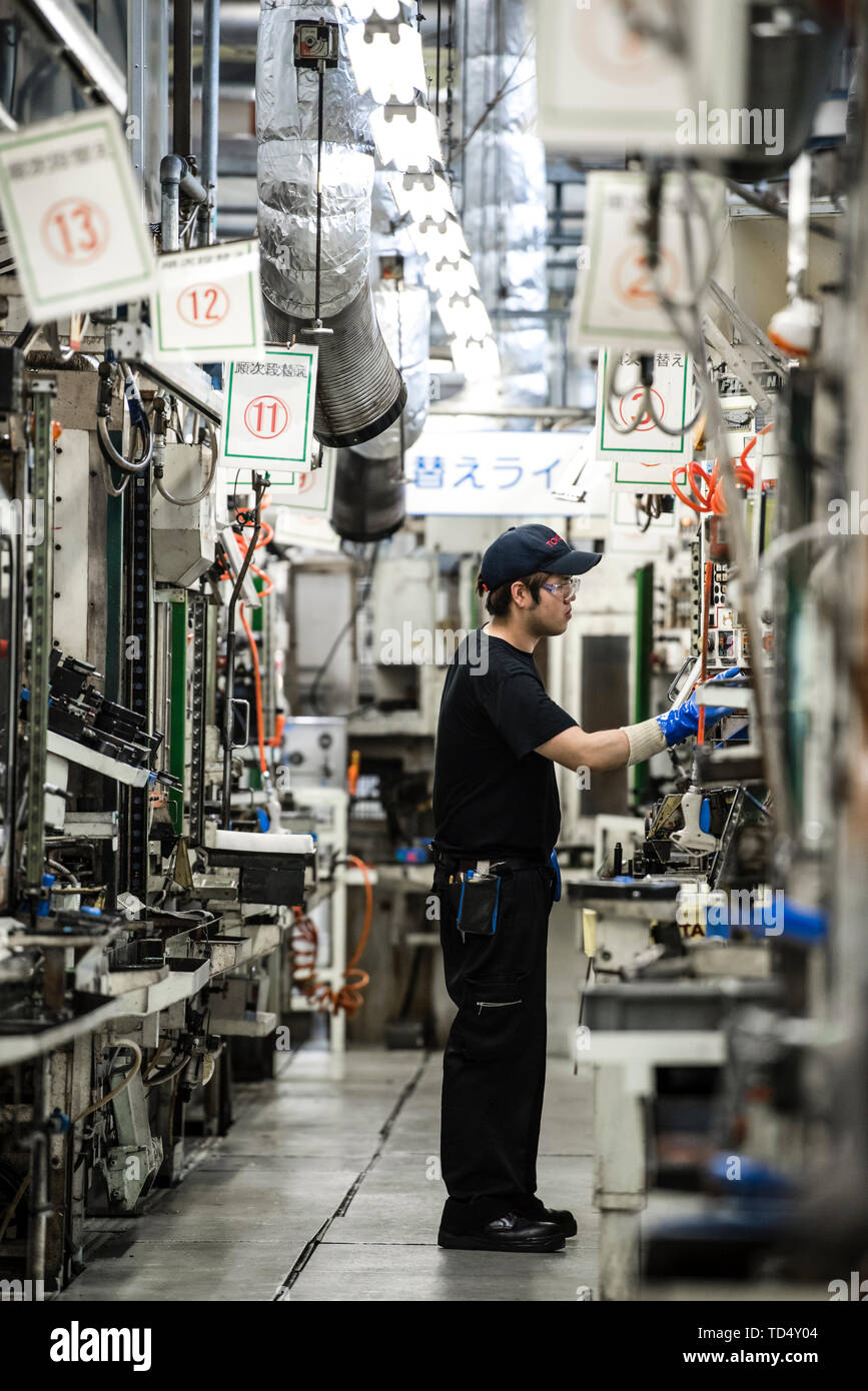 JULY 6, 2018 - File Photo - A Toyota employee assembles engine parts at ...