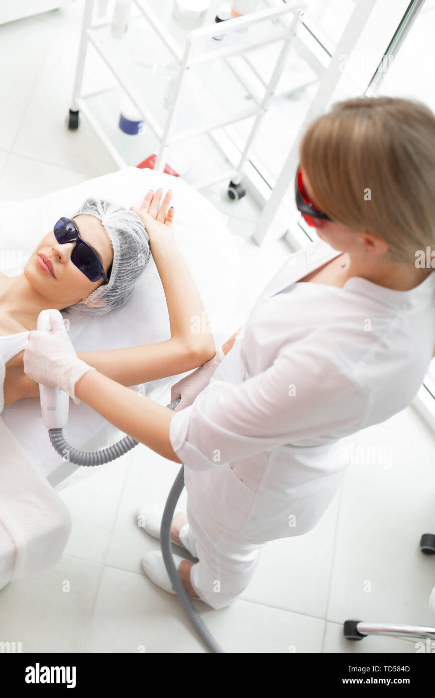 Laser epilation process. Top view of a hair removal procedure in the ...