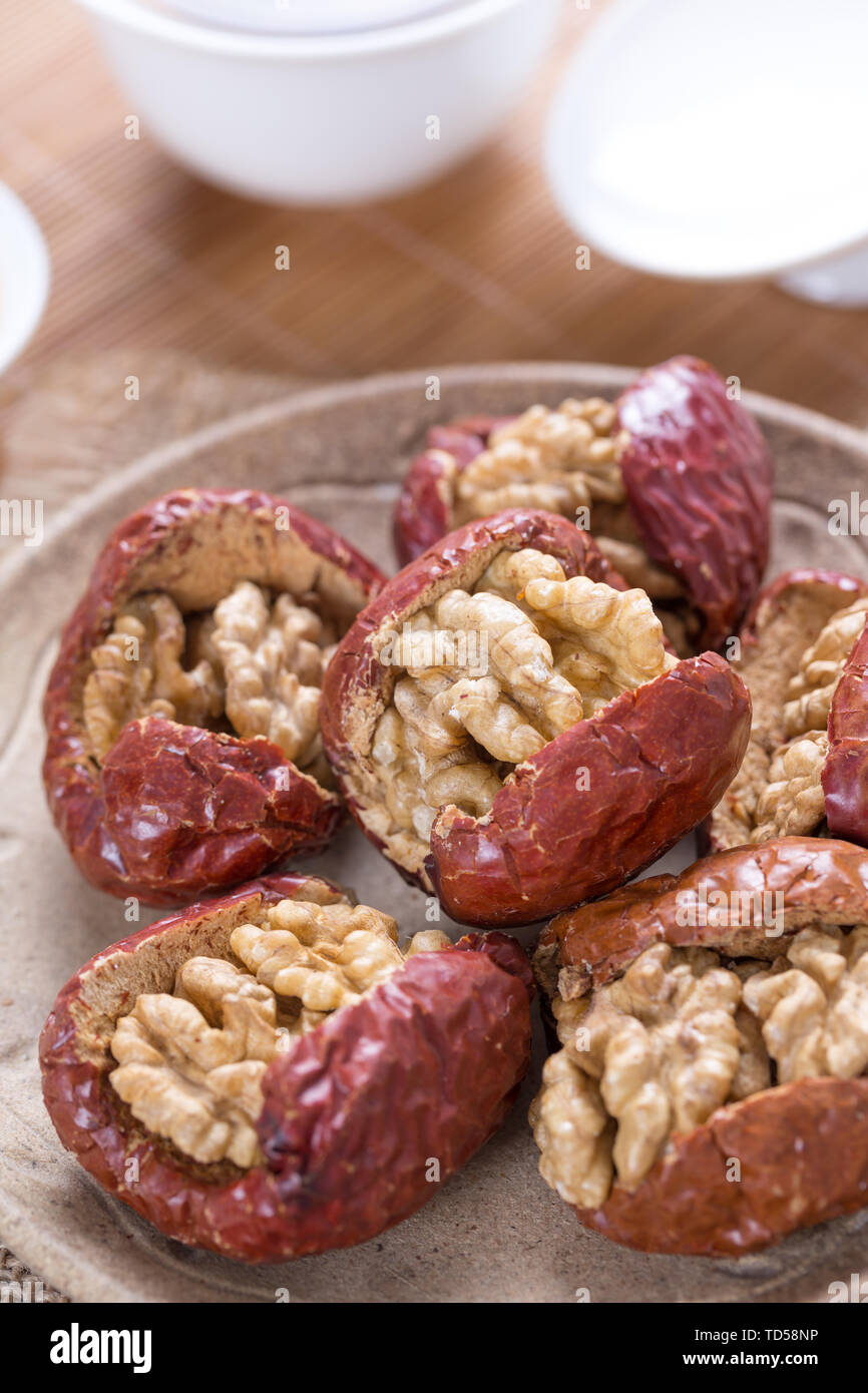 Jujube sandwiched walnuts, special cuisine Stock Photo - Alamy