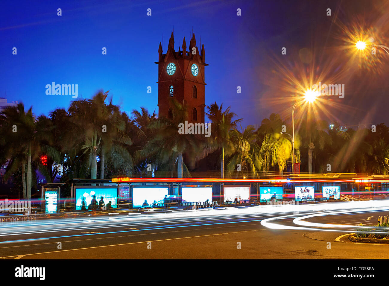 Night view of the clock tower in Haikou, Hainan Stock Photo - Alamy