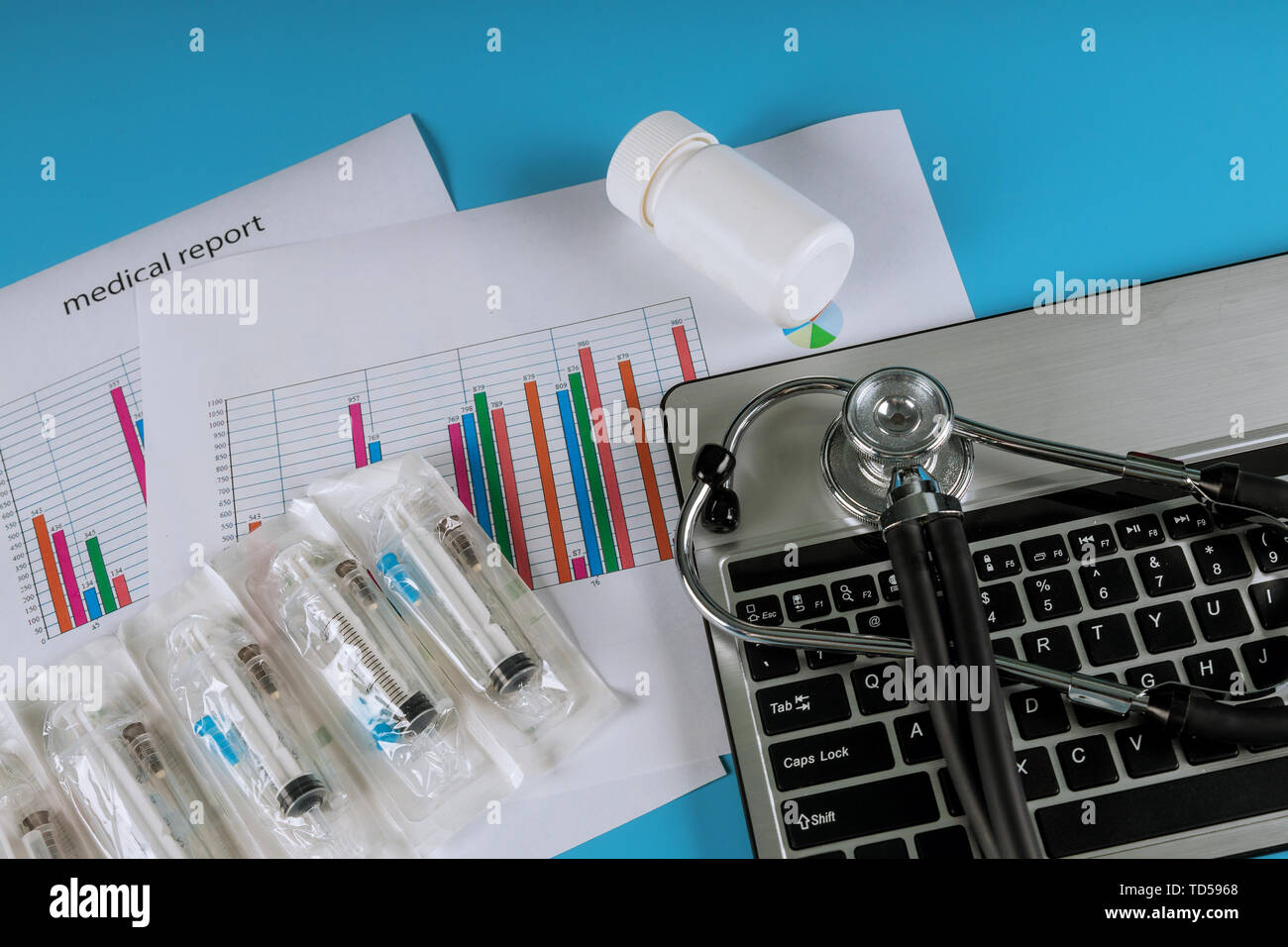 Medical technology analysis and a stethoscope with modern laptop ...