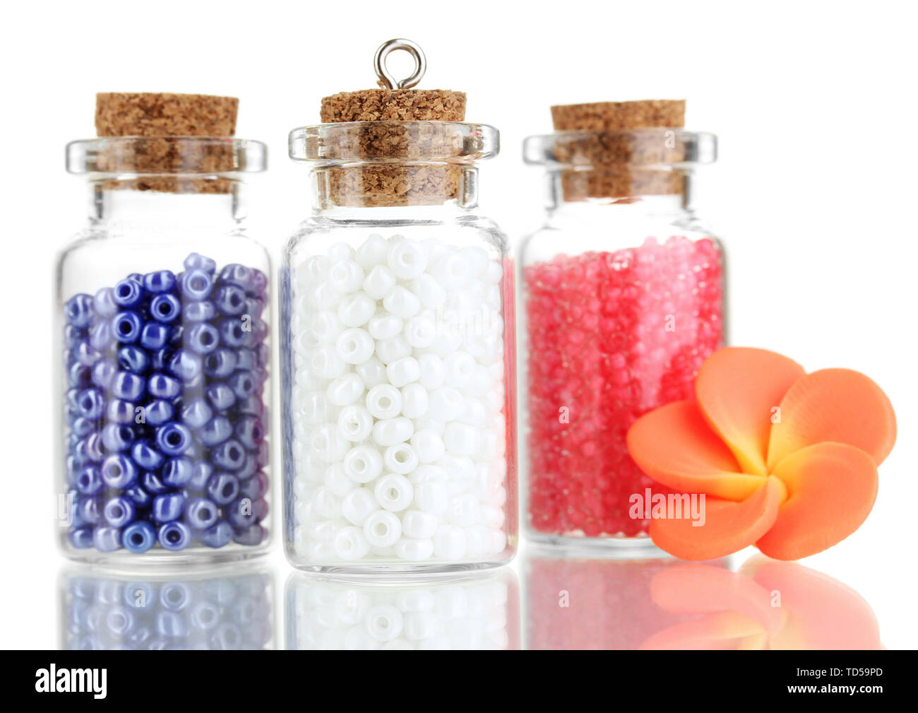 Little bottles full with colorful beads isolated on white Stock Photo ...