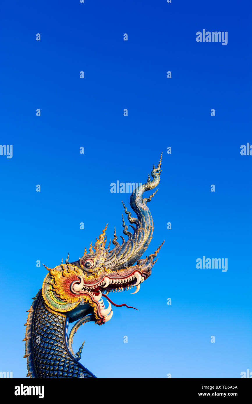 Naga head at Wat Rong Suea Ten (Blue Temple) in Chiang Rai, Thailand ...