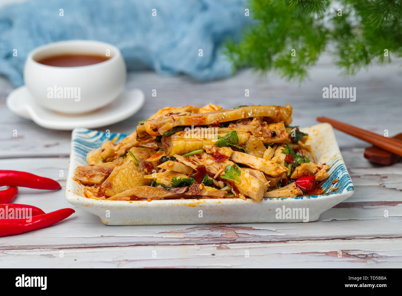 drooling chicken, stick chicken Stock Photo - Alamy
