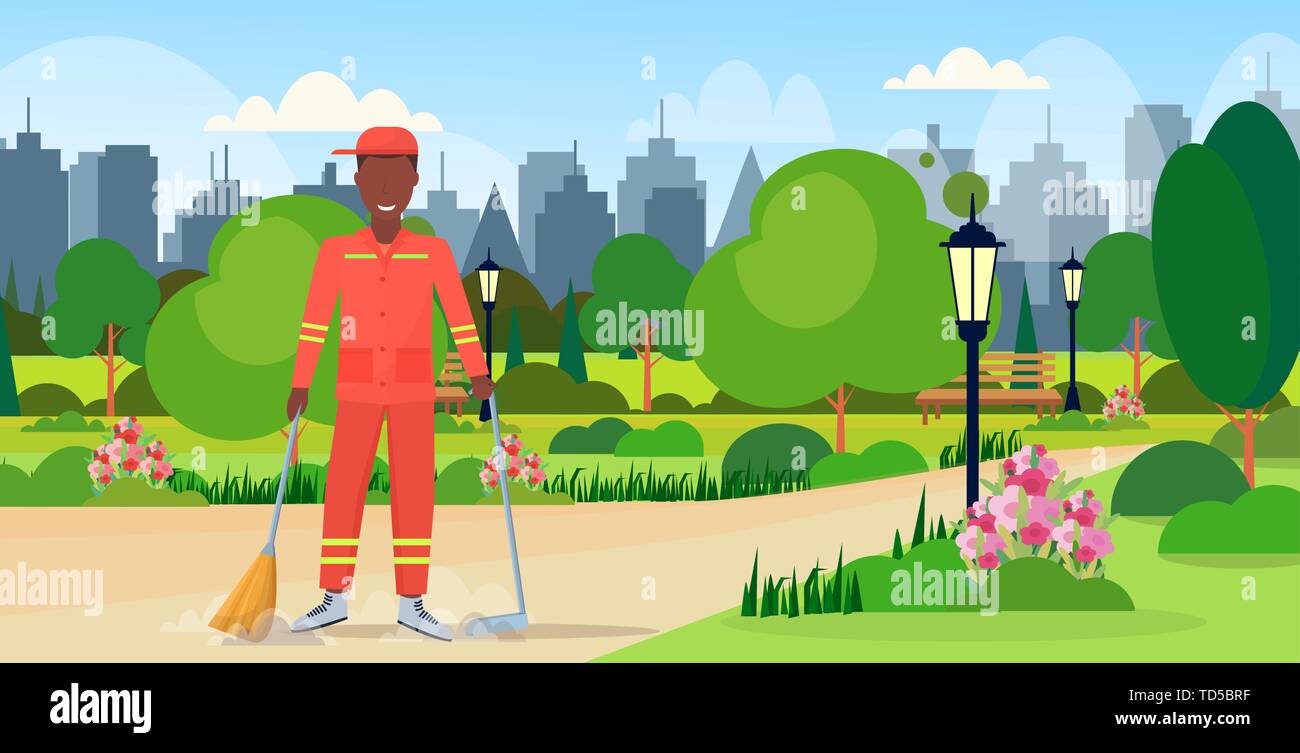 male street cleaner holding broom and dustpan african american man ...