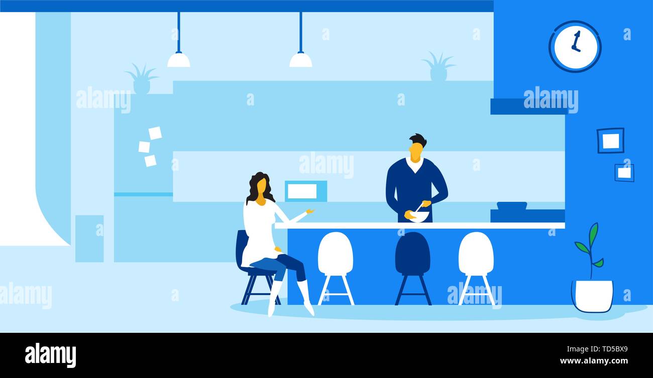 man making dinner and discussing with woman couple cooking food at home ...