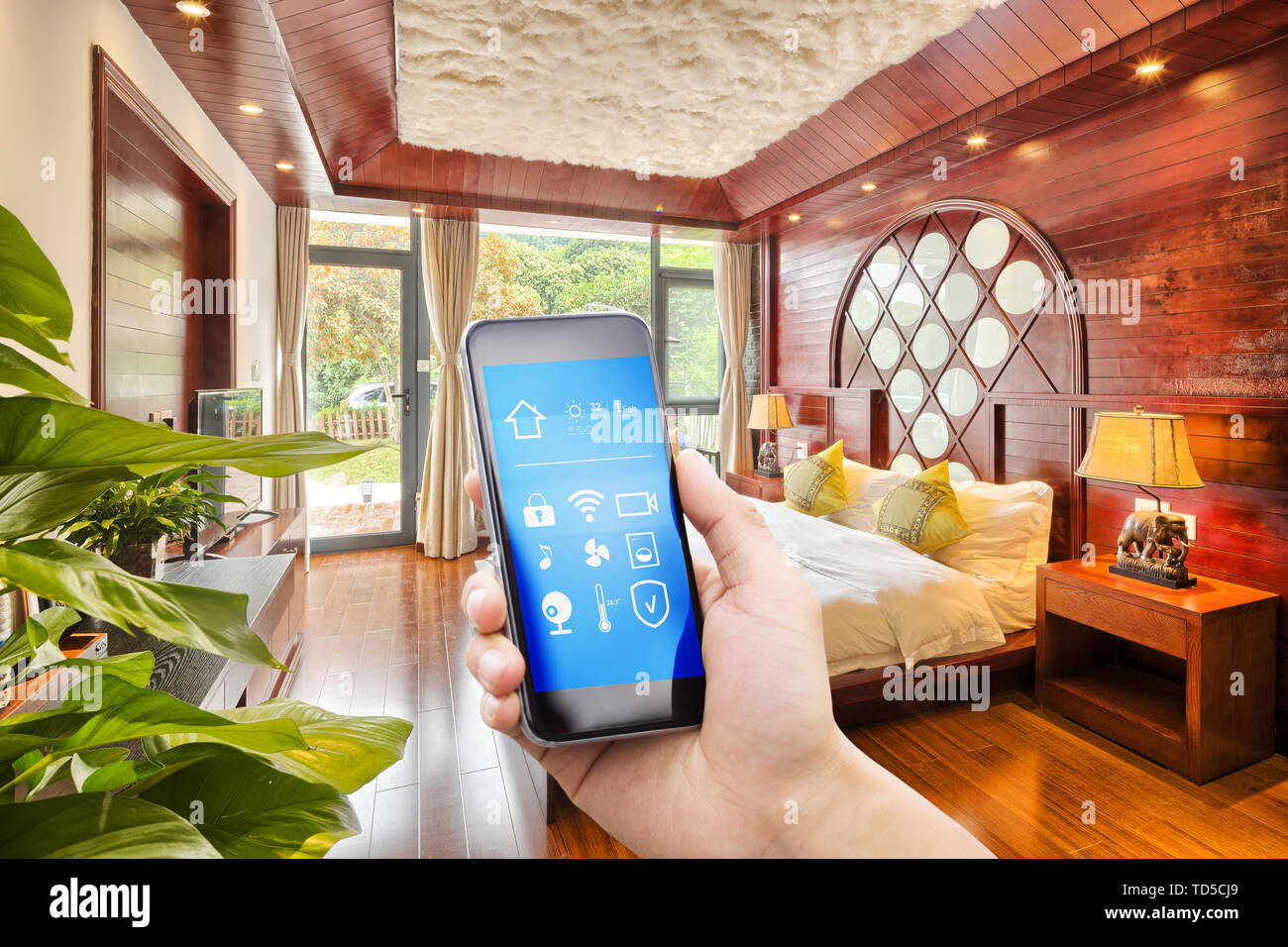 smart phone with smart home and modern bedroom Stock Photo - Alamy