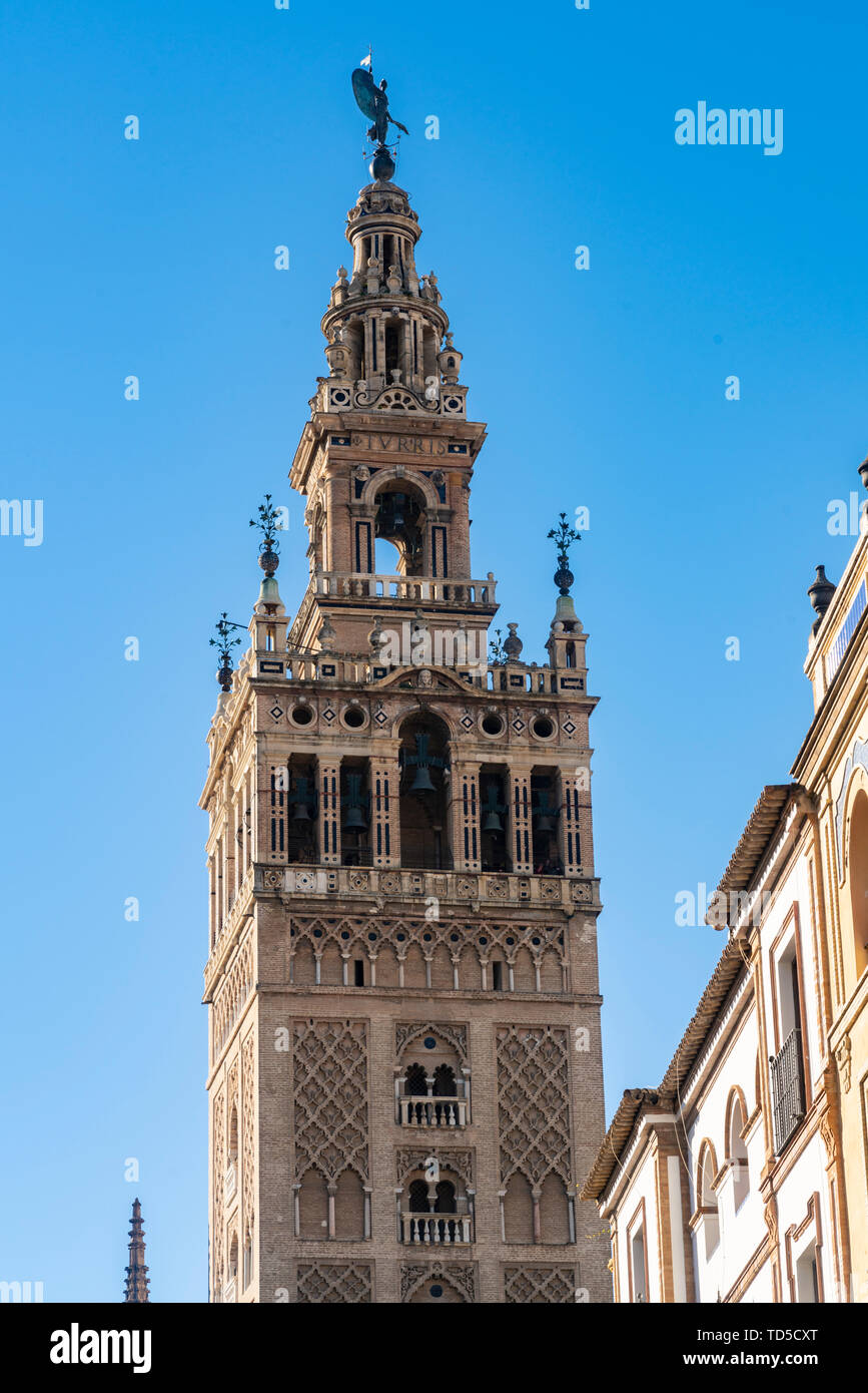 La Giralda, the bell tower of the Cathedral of Seville, originally the ...