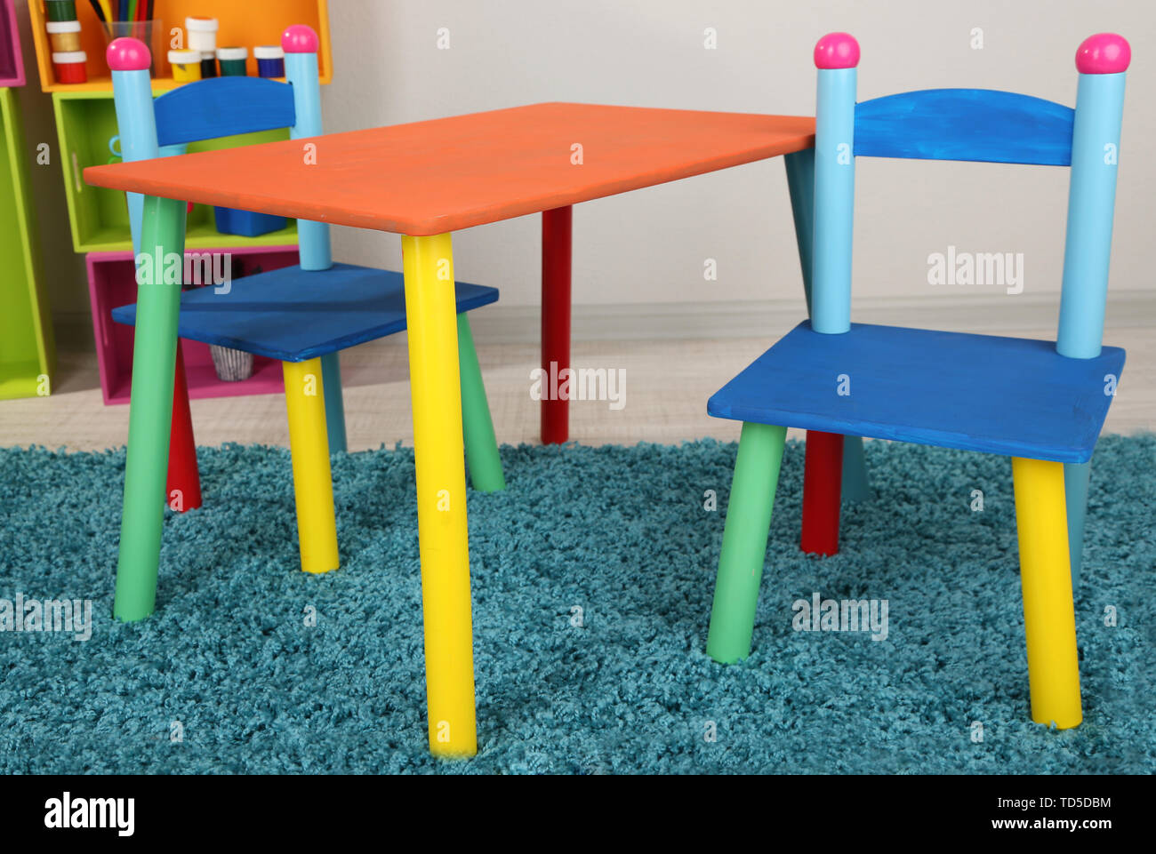 Small and colorful table and chairs for little kids Stock Photo - Alamy