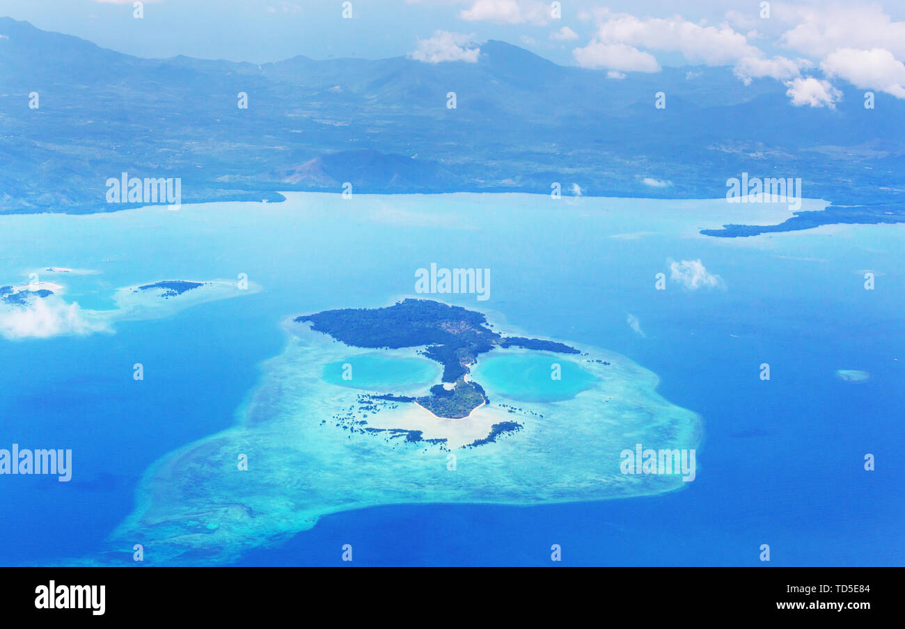 Aerial view from aircraft flying in tropical island. Landscape from ...