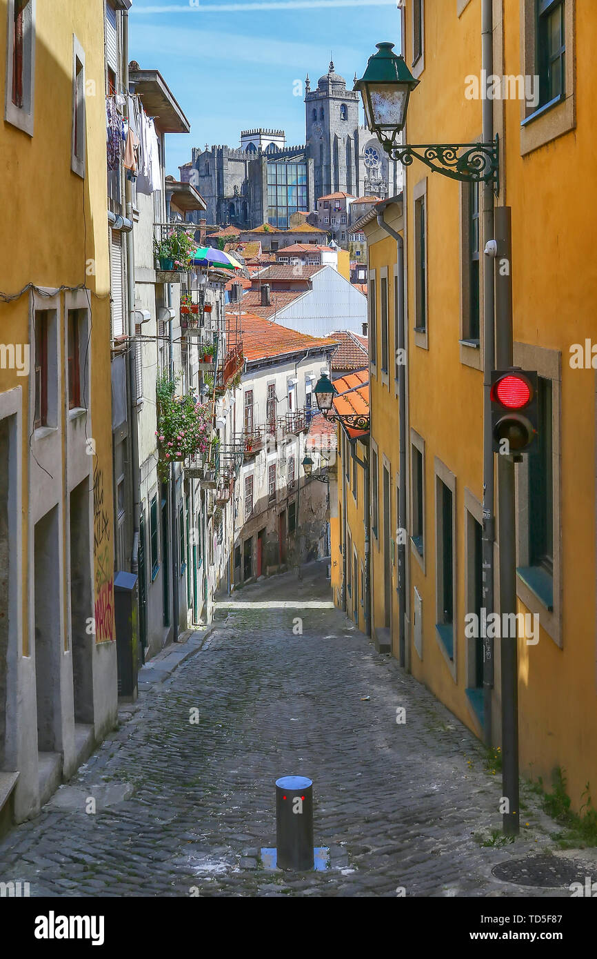 Porto, Portugal old town narrow street perspective view with colorful ...